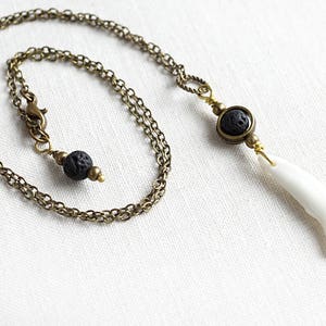 ON VACATION, Dainty Wolf Tooth Necklace Wolf Necklace Black Lava Raw ...