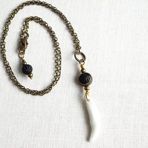 ON VACATION, Dainty Wolf Tooth Necklace Wolf Necklace Black Lava Raw ...