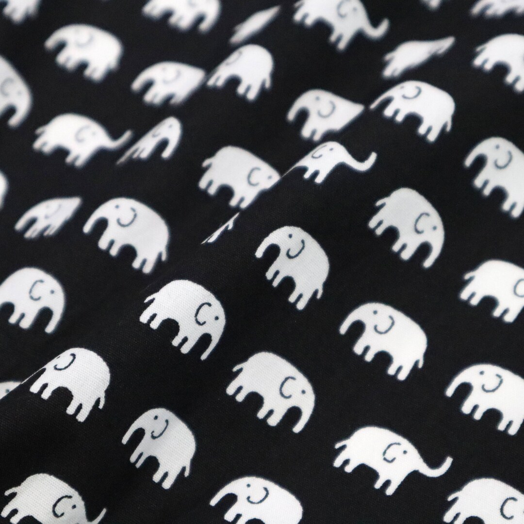 White Elephant Fabric - Little White Elephant Printed on Black Cotton ...