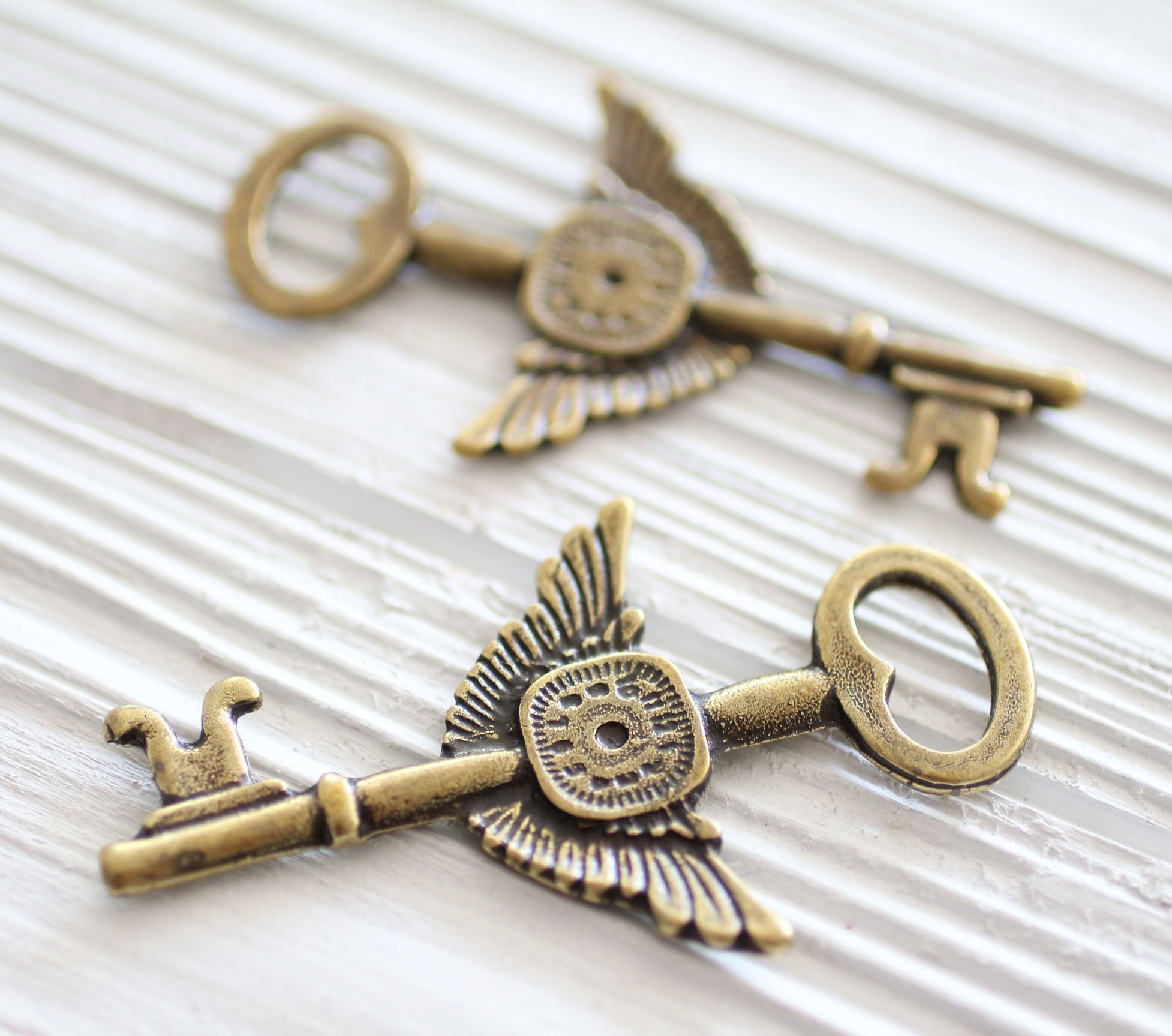 Key pendant, angle wings, antique gold key, key medallion, rustic key ...