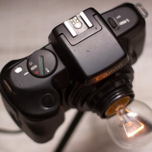 Edison Lamp Made From Old Film Camera. Dimmer Optional. Photographer ...