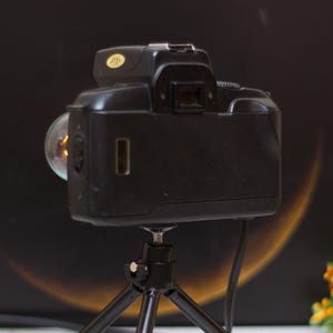 Edison Lamp Made From Old Film Camera. Dimmer Optional. Photographer ...