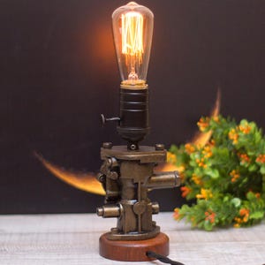 Steampunk Edison Lamp. an Old Carburetor and an Edison Bulb. Absolutely ...