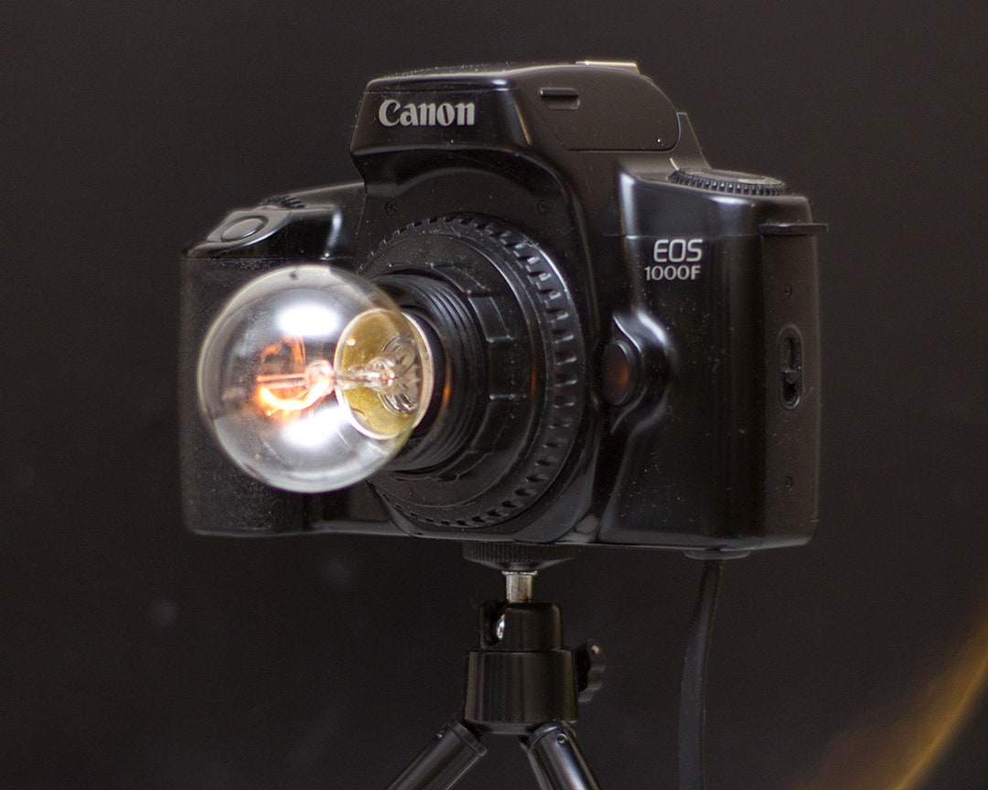 Edison Lamp Made From an Old Film Camera. Dimmer Optional. Photographer ...