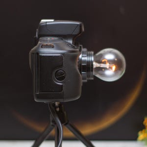Edison Lamp Made From Old Film Camera. Dimmer Optional. Photographer ...