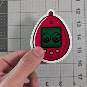 Red Tamagotchi Angry Eyes Vinyl Stickers, Videogame Stickers, Cute ...