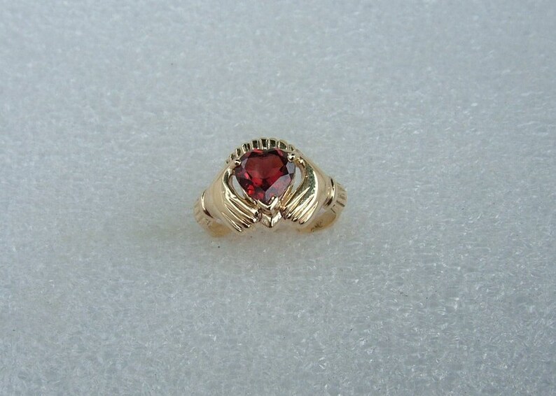 Gold Claddagh Ring With a Red Garnet Heart. Red Garnet Set in 10 Carat ...