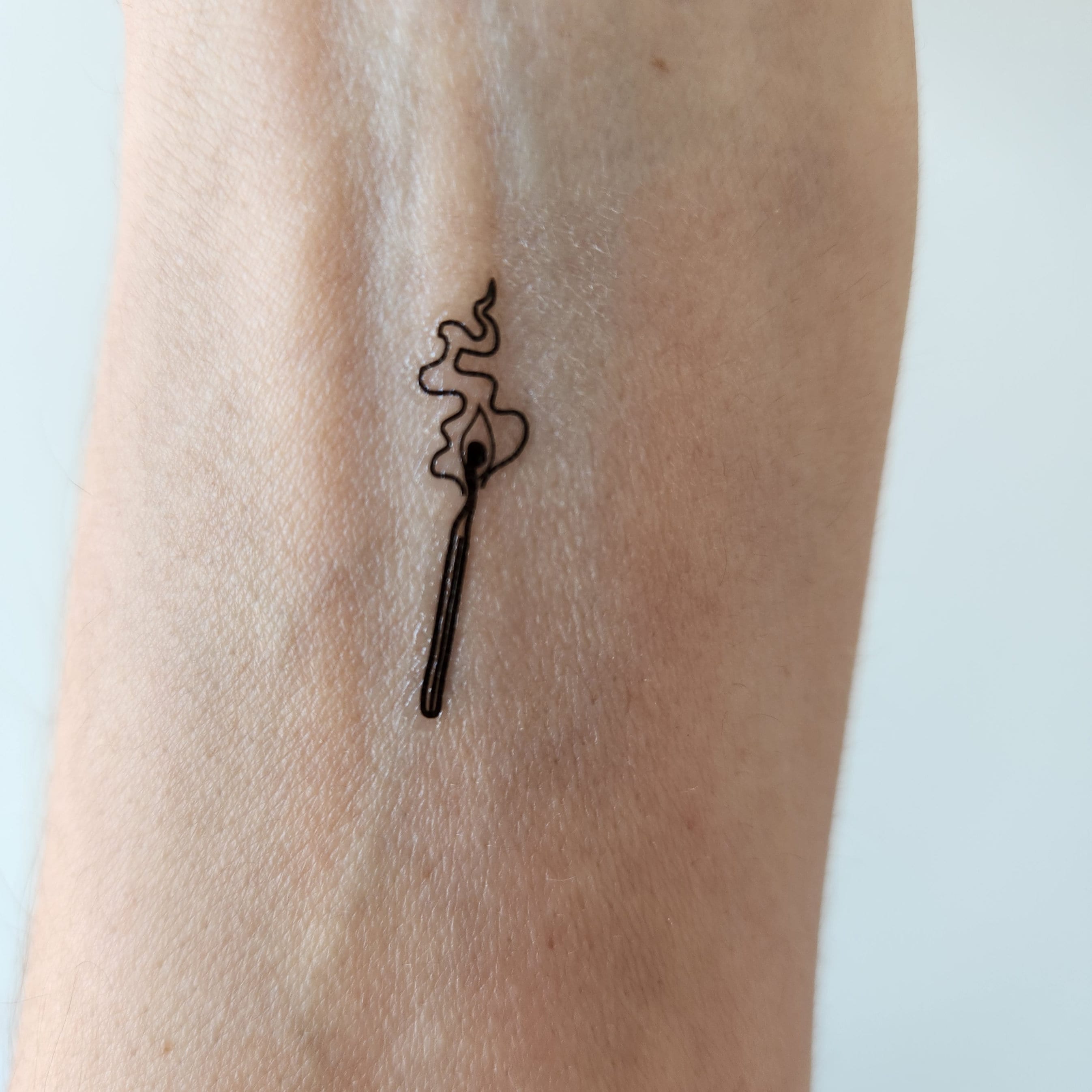 Lit Match Tattoo