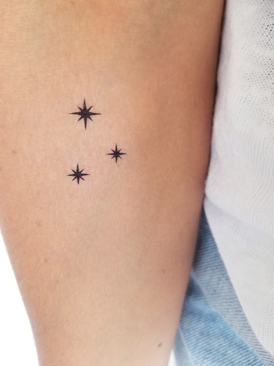 Tatuaggio temporaneo di piccole stelle o scintille - Etsy Italia
