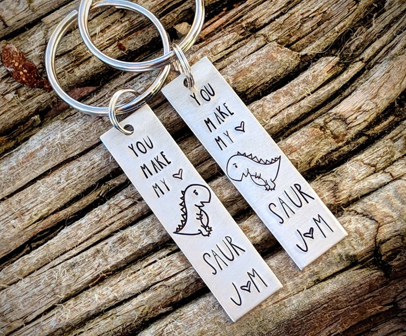 Personalized hand stamped matching set of couples keychains. | Etsy
