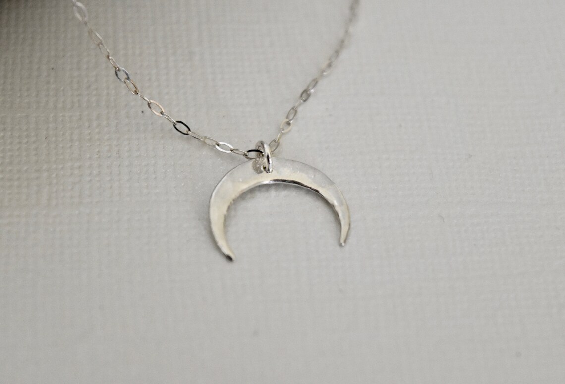 Silver crescent moon necklace // silver hammered moon necklace | Etsy