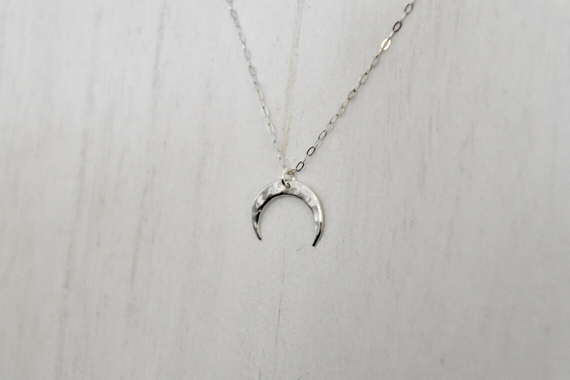 Silver crescent moon necklace // silver hammered moon necklace | Etsy