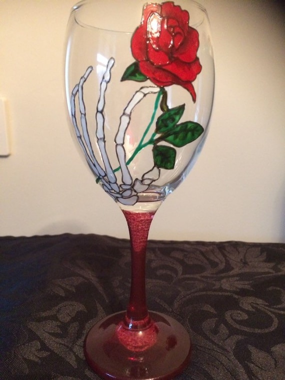 Skeleton Hand Holding Wine Glass - Glass Designs