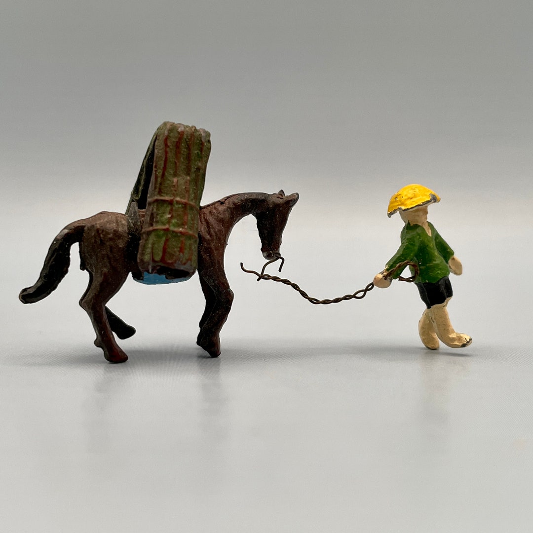 Antique Miniature Cast Iron Man and Horse Toy Figures - Etsy
