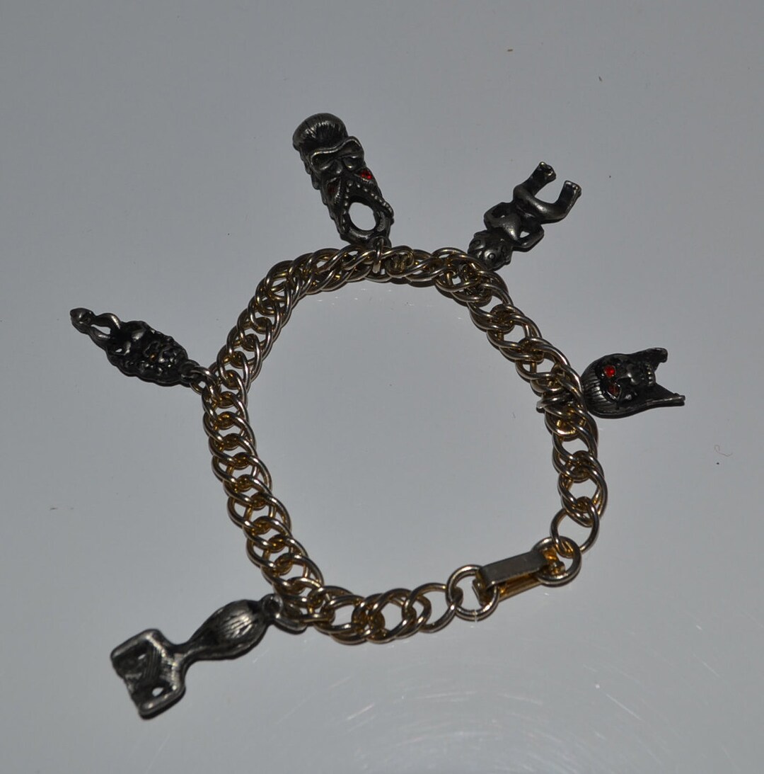 Vintage Charm Bracelet With 5 Tribal Alien Charms With Red Rhinestone ...