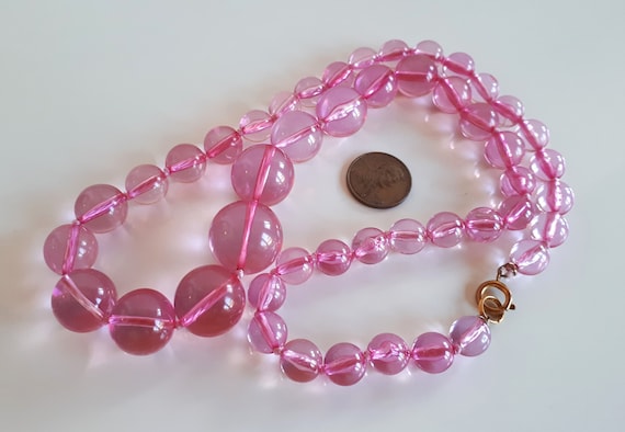 Vintage pool of light transparent pink lucite plastic… - Gem