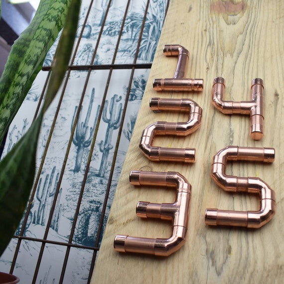 Numbered Old Copper Pipes