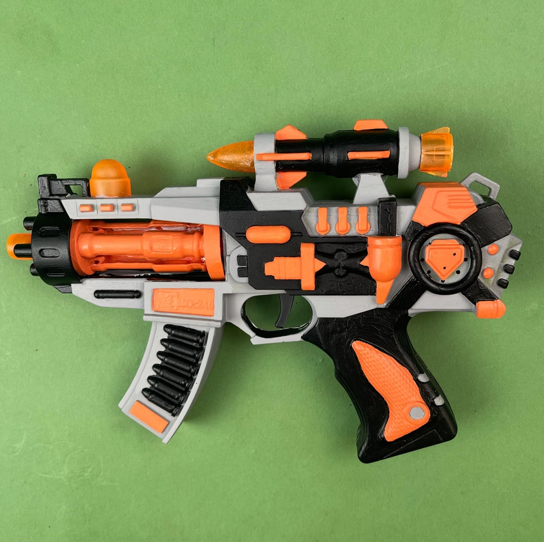 Light up Sci Fi Blaster - Noise Making Spinning Gun Prop for Futuristic ...