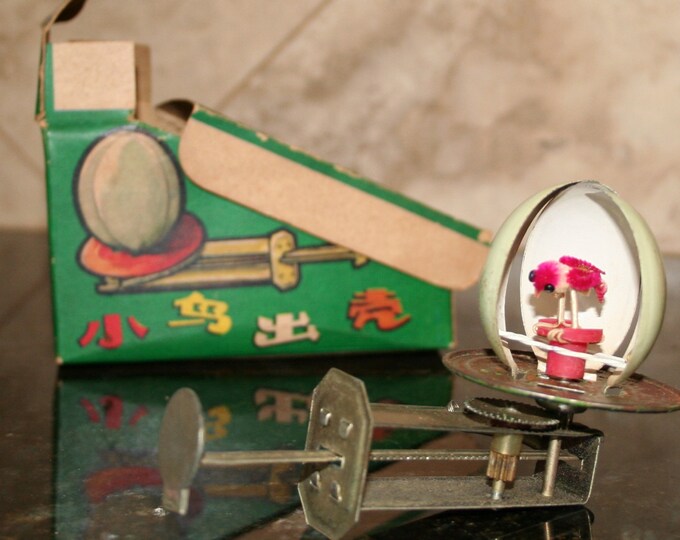 Bird in Shell Tin Toy - Etsy