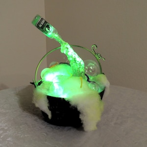 Witches Cauldron Floating Potion Bubbling Brew and Flashing Green ...
