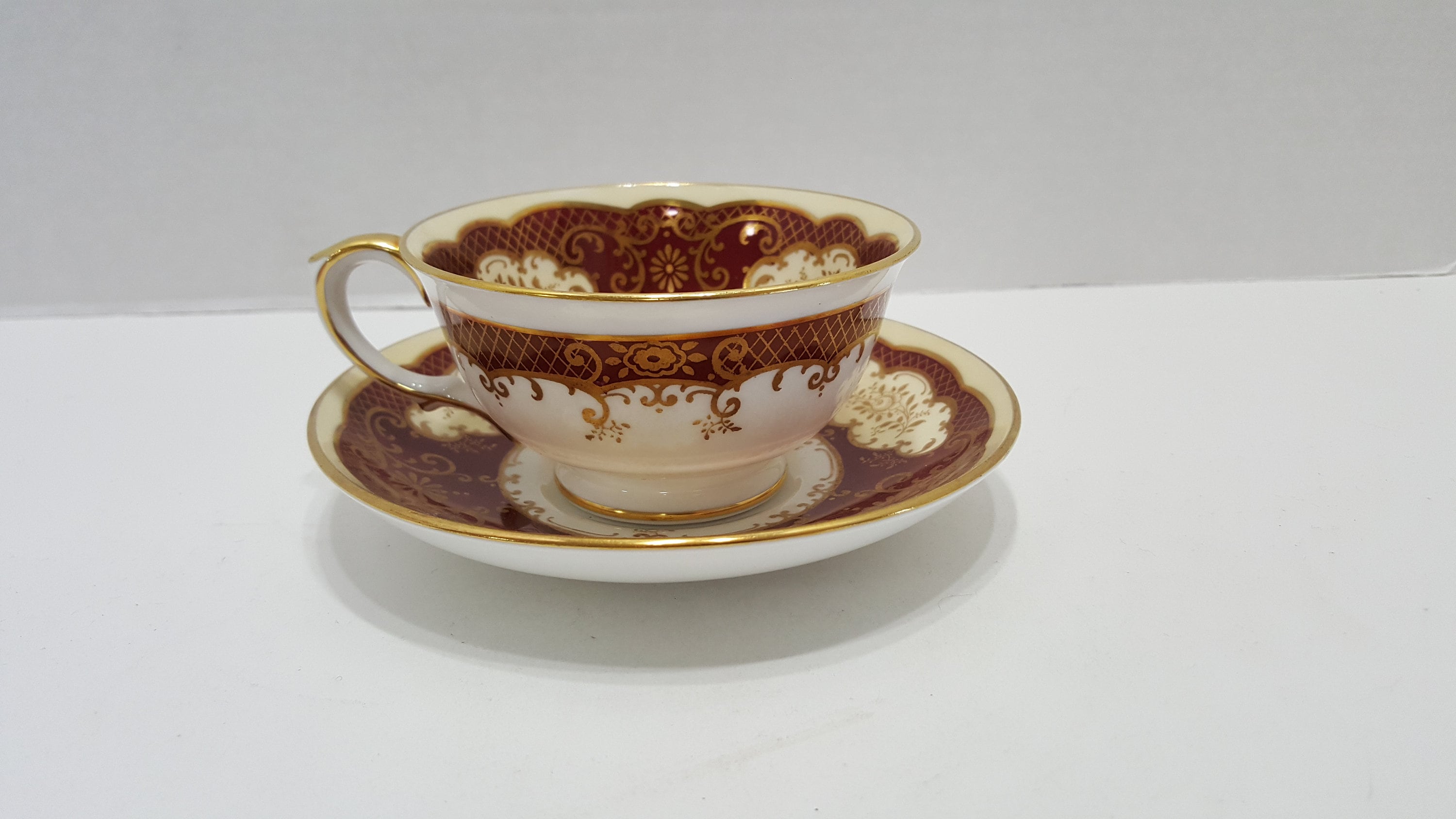 Vintage Crown Staffordshire Tea Cup and Saucer Burgundy and Gold