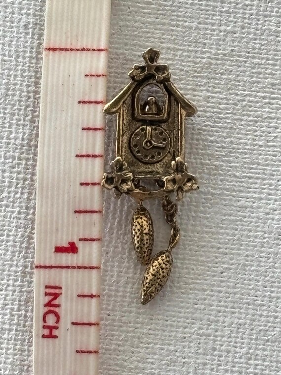 Vintage Avon gold tone cuckoo clock push back pin wit… - Gem