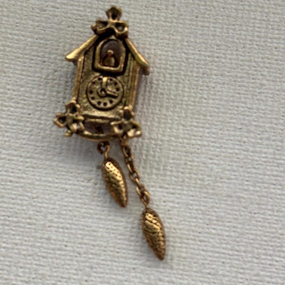 Vintage Avon gold tone cuckoo clock push back pin wit… - Gem
