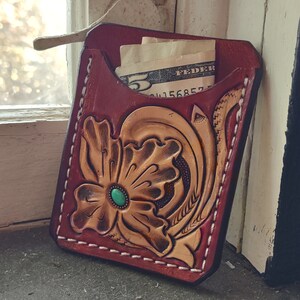 Tooled Leather Card Wallet With One Pocket. Red Background and Natural ...