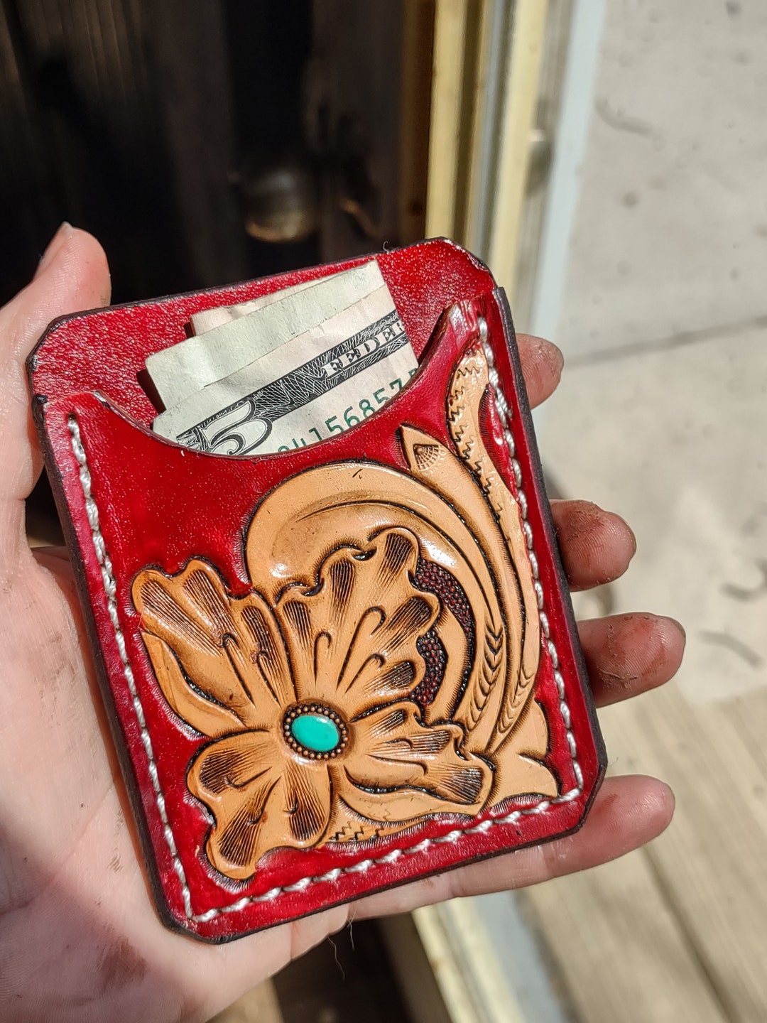 Tooled Leather Card Wallet With One Pocket. Red Background and Natural ...