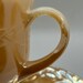 Fire King Marigold Peach Luster Ware Teacup and Saucer Orange W/ Laurel ...