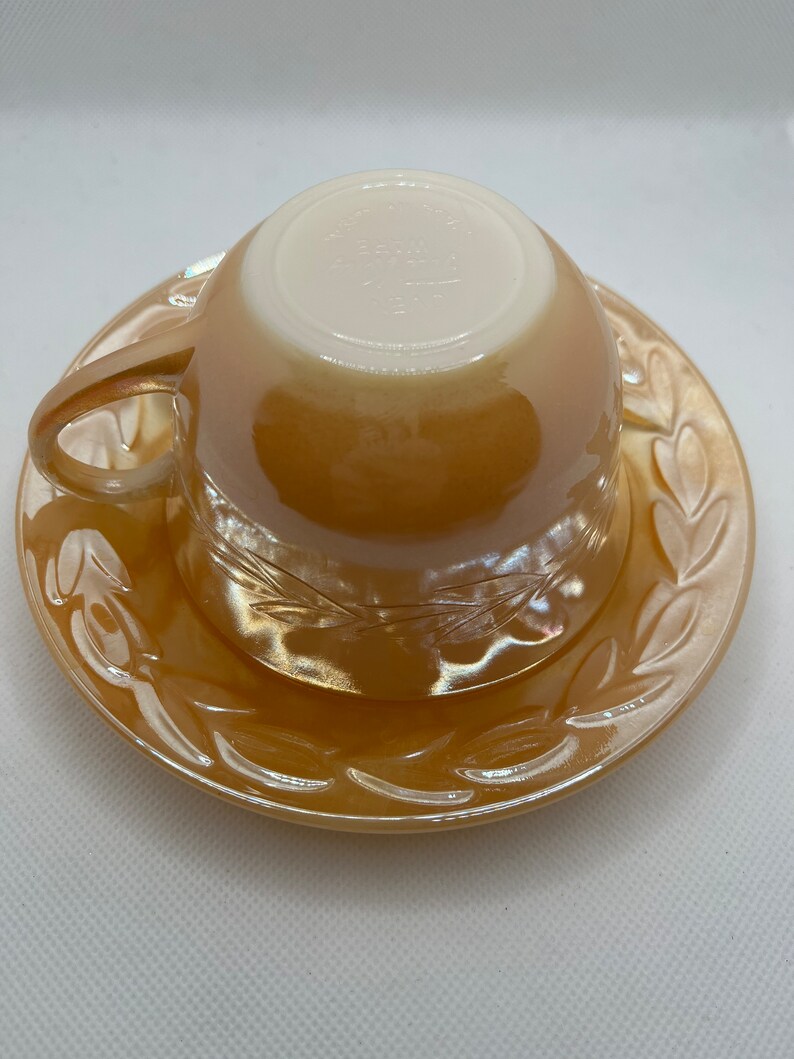Fire King Marigold Peach Luster Ware Teacup and Saucer Orange W/ Laurel ...