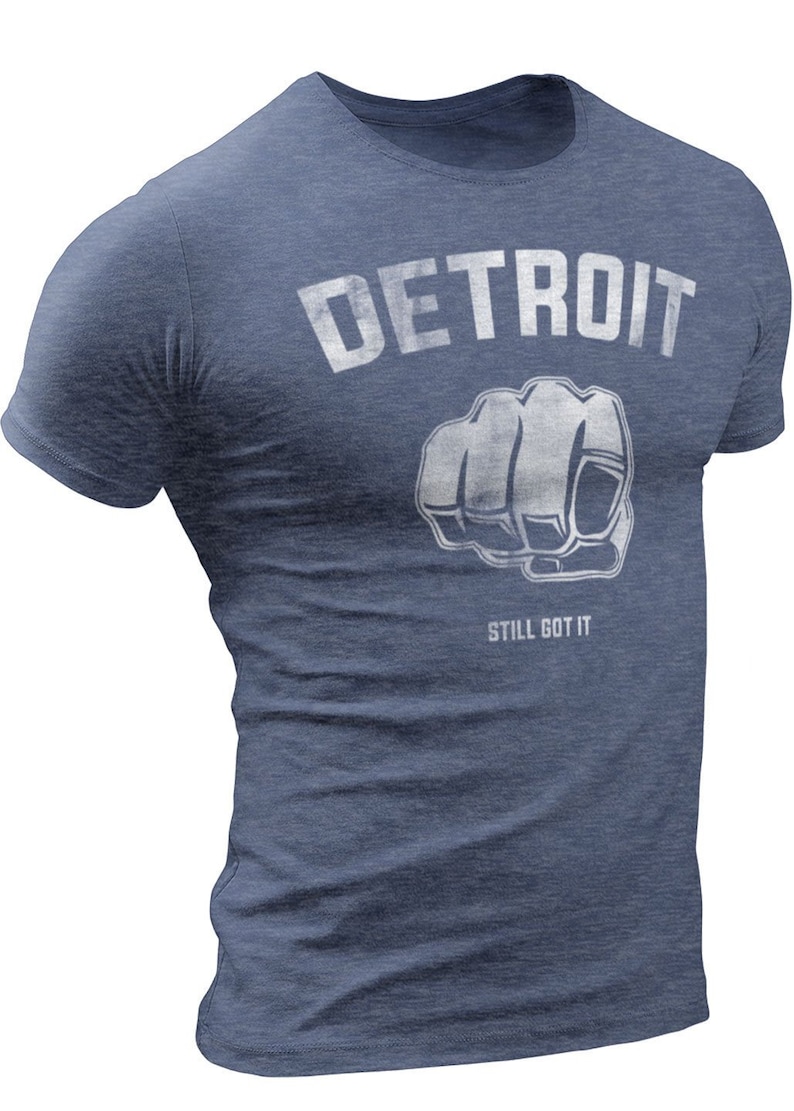 Detroit T-shirts: Fist of Detroit T-shirt by Detroit Rebels. - Etsy