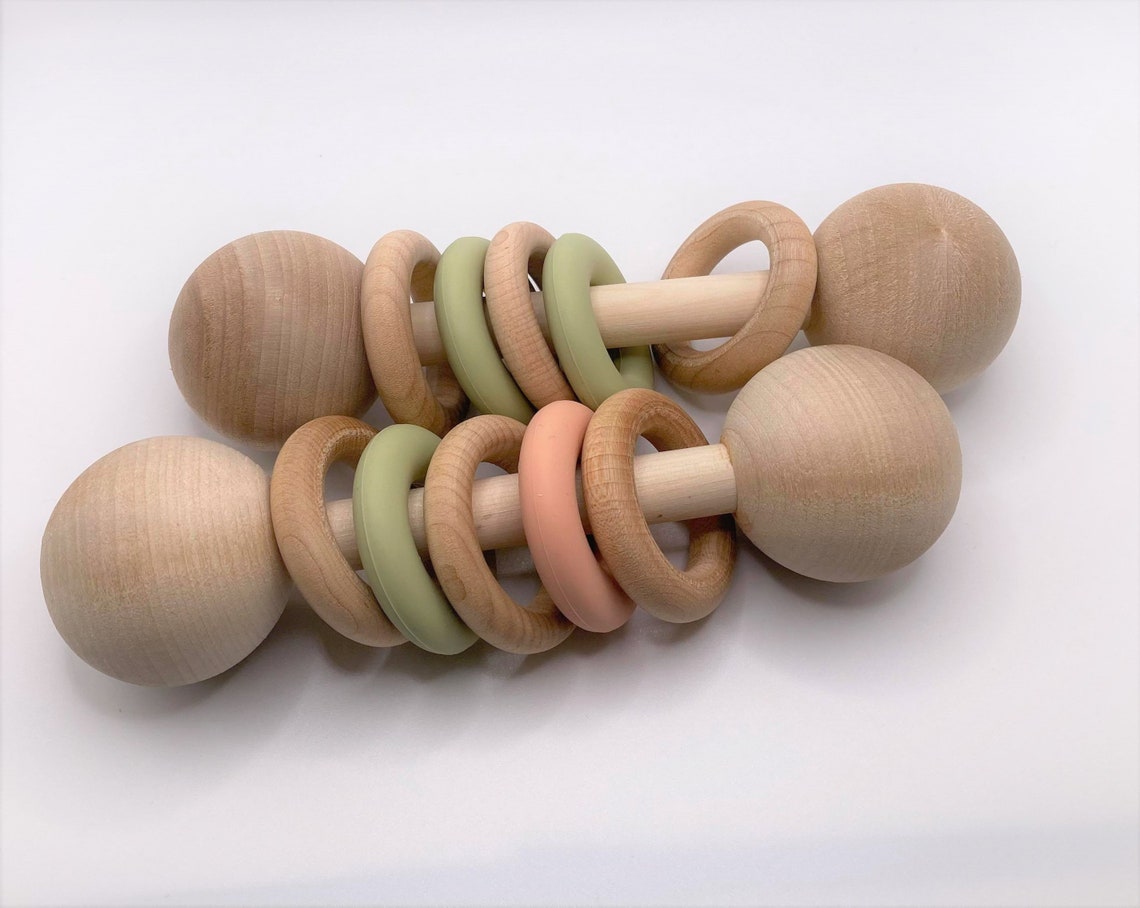Unique Montessori wooden rattle with silicone rings mix and | Etsy