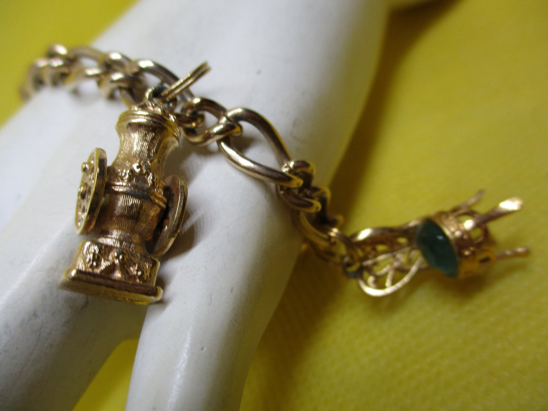 VTG Avon Charm Bracelet Avon Gold Tone Charm Bracelet Charms Include ...