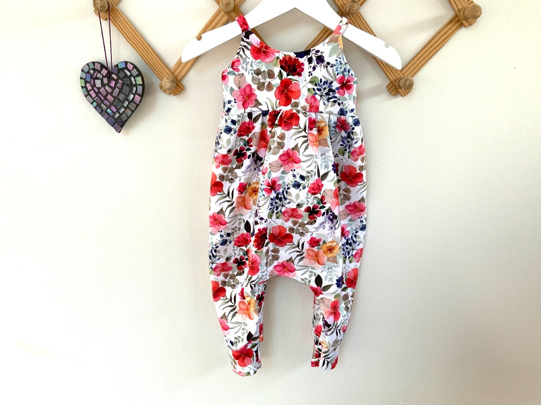 Baby Romper Featuring a Babydoll Bodice With Fixed Straps and a Drop ...