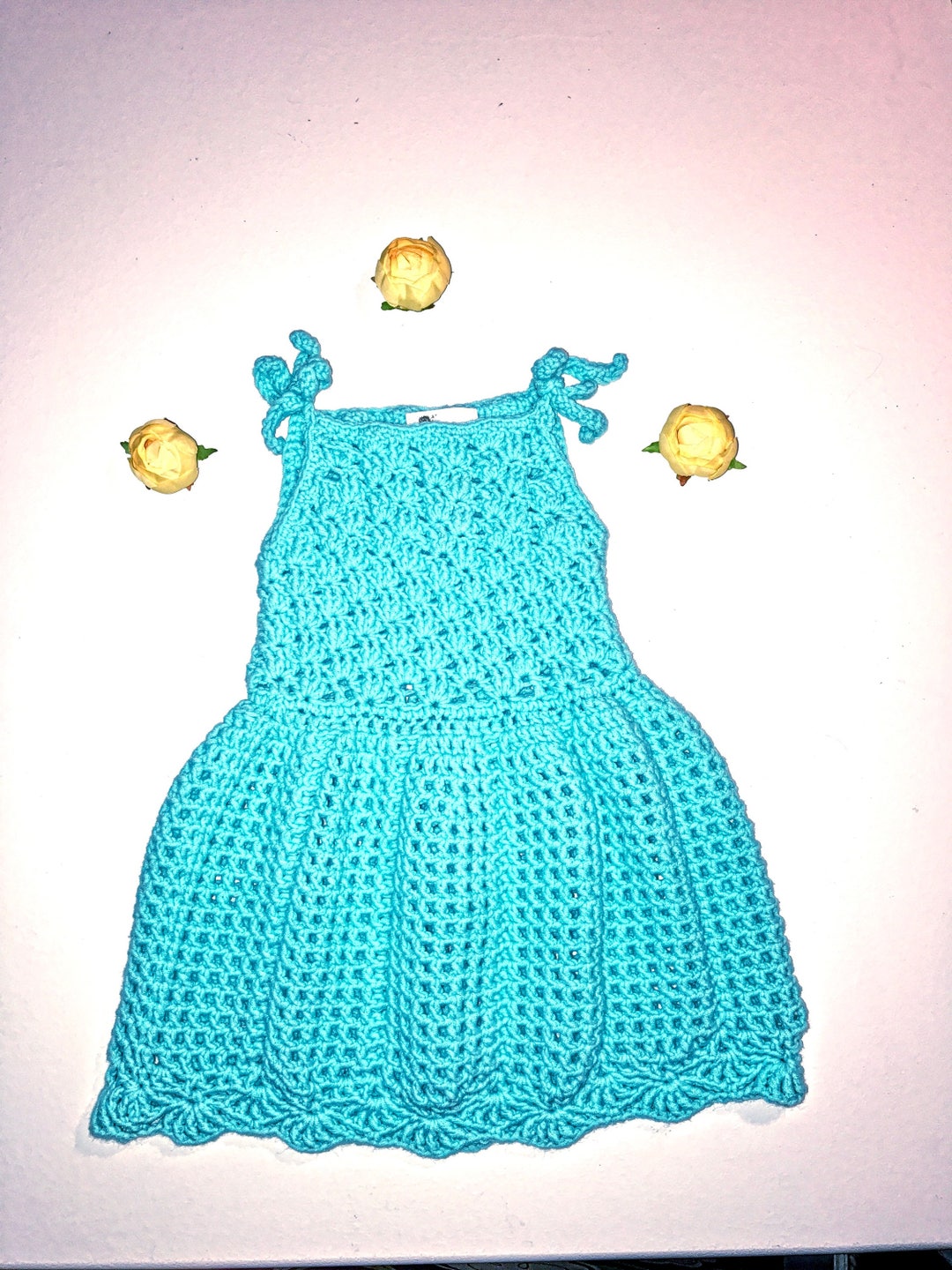 Soft and squishy aqua cotton yarn makes this beautiful little girls ...