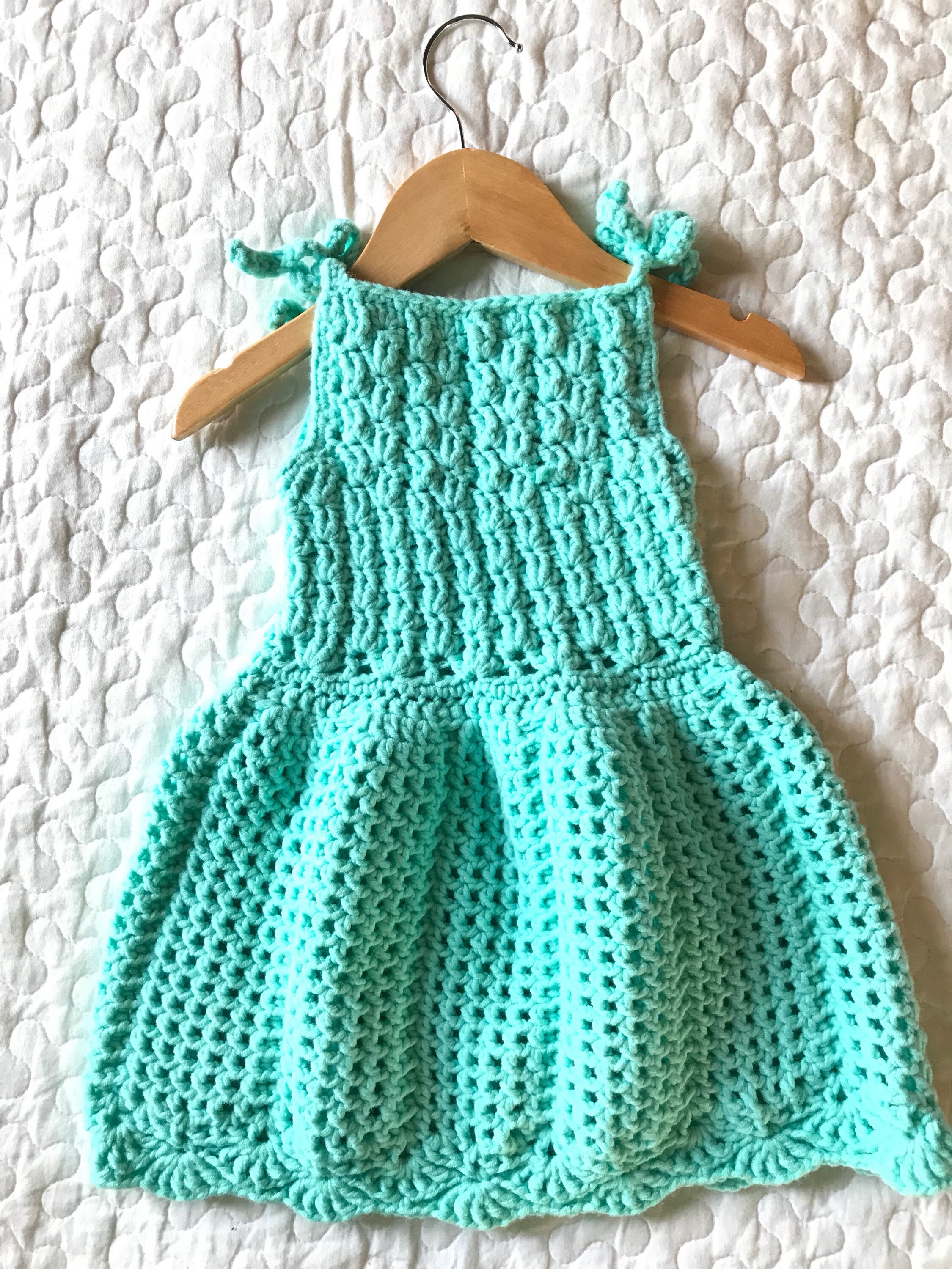 Soft and squishy aqua cotton yarn makes this beautiful little girls ...