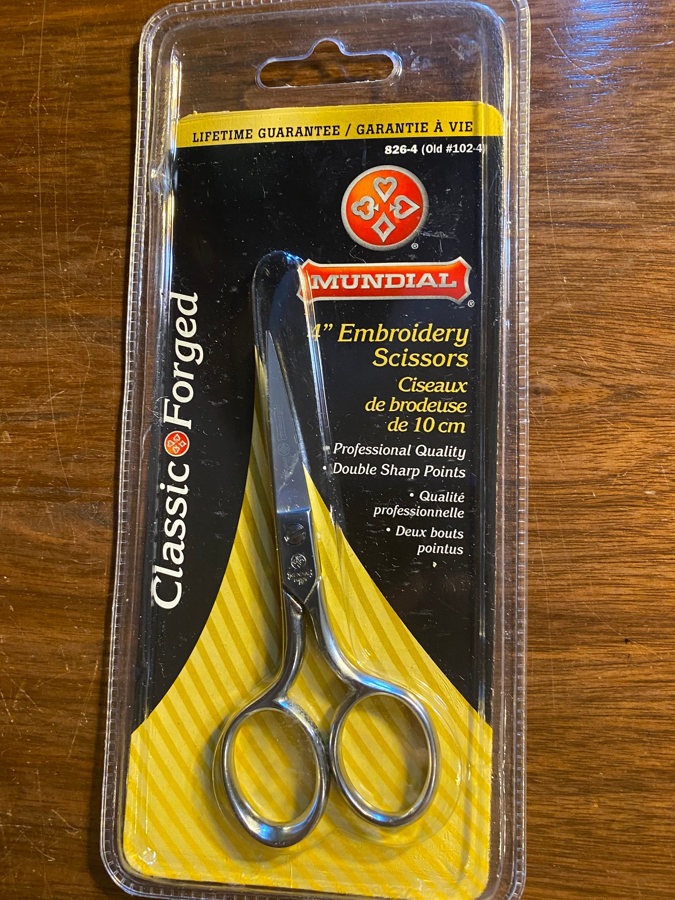 Mundial Scissors Logo