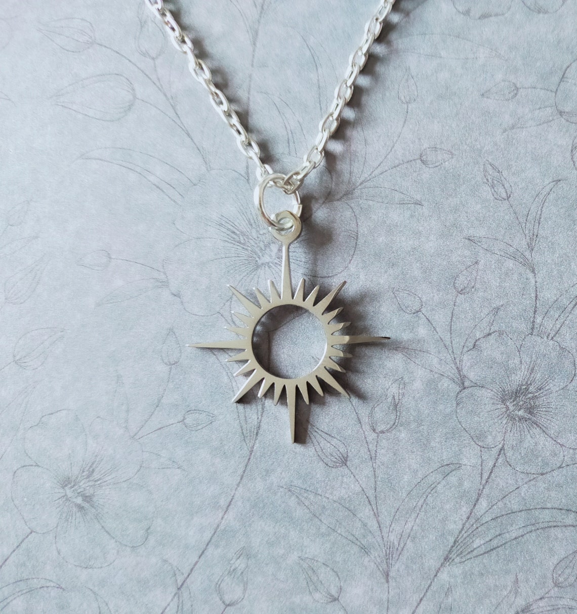 Solar eclipse emblem stainless steel pendant on a silver | Etsy