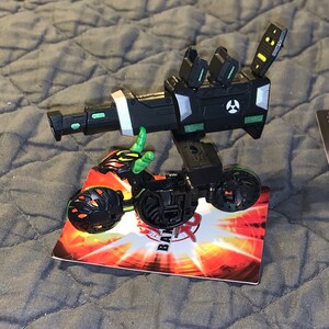 BAKUGAN Battle Combo Set Ramdol 910g & Mega Blaster Battle Gear Darkus ...