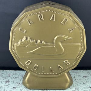 Vintage 1990’s Gold-coloured Plastic Canadian “loonie” Bank With ...