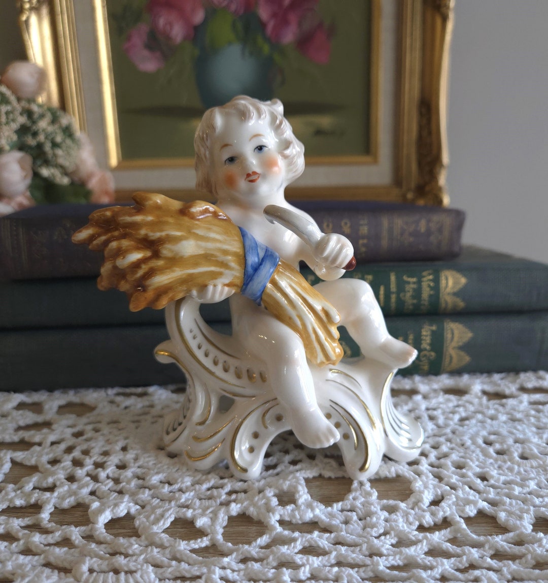 GOEBEL A Goebel Cherub Porcelain Figurine From the 4 Seasons Series ...