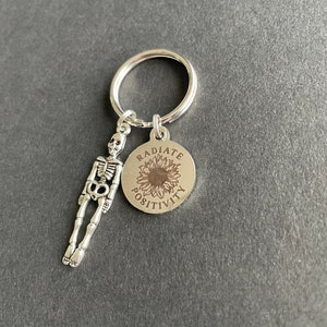 Radiate Positivity Keychain, Sunflower, Skeleton, Skull, Caduceus ...