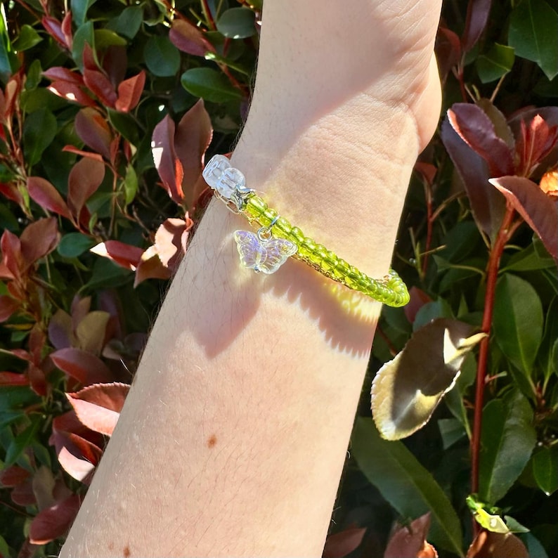 Friendship Bracelet: Green Crystal Glass Beads, Elastic, Silver, Charms ...