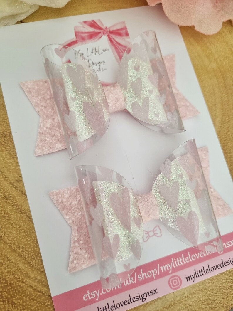 Lazo para el pelo con forma de corazón con purpurina rosa y blanca **SE ...