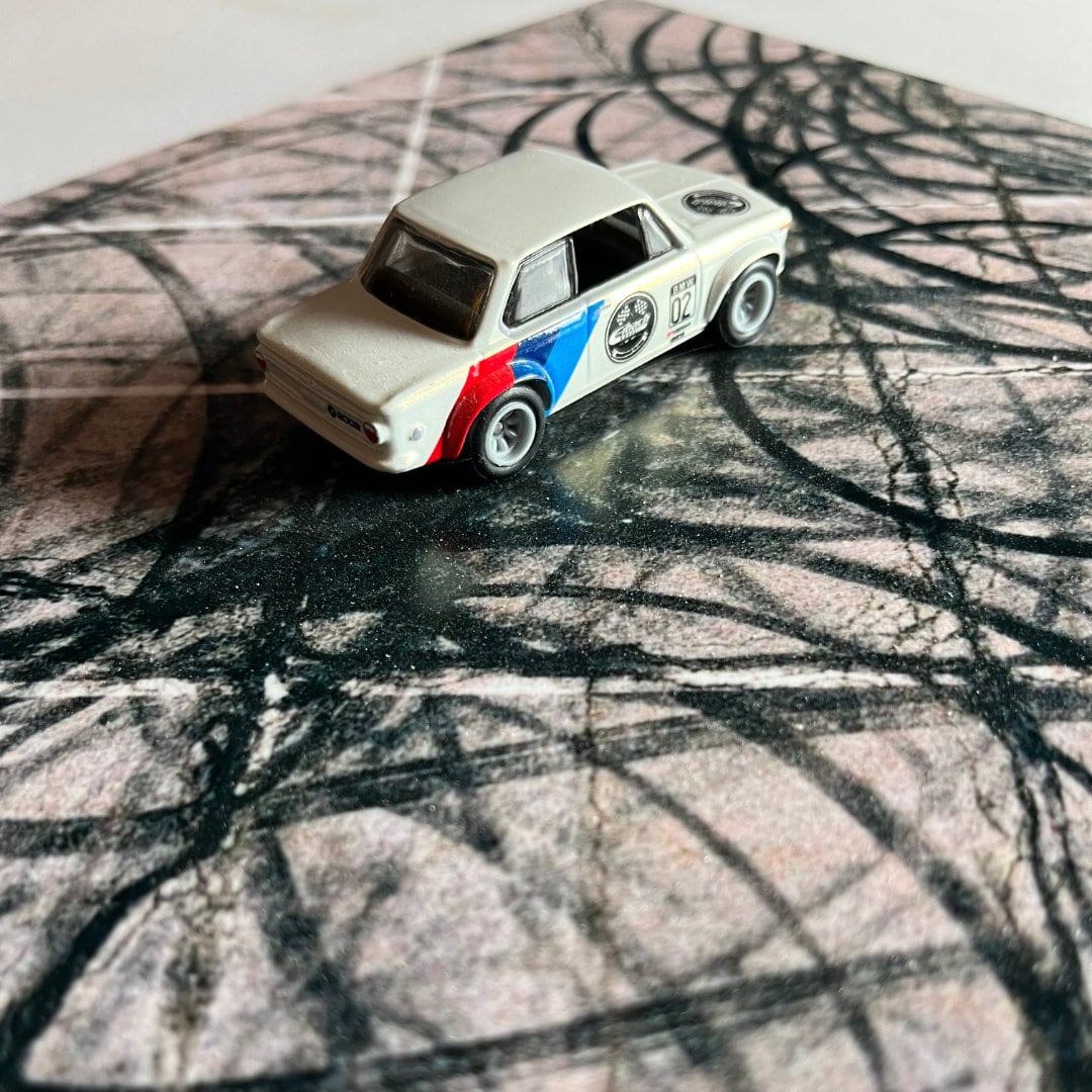 A Single Matchbox Car Mounted on High Resolution Parking Lot With Black ...