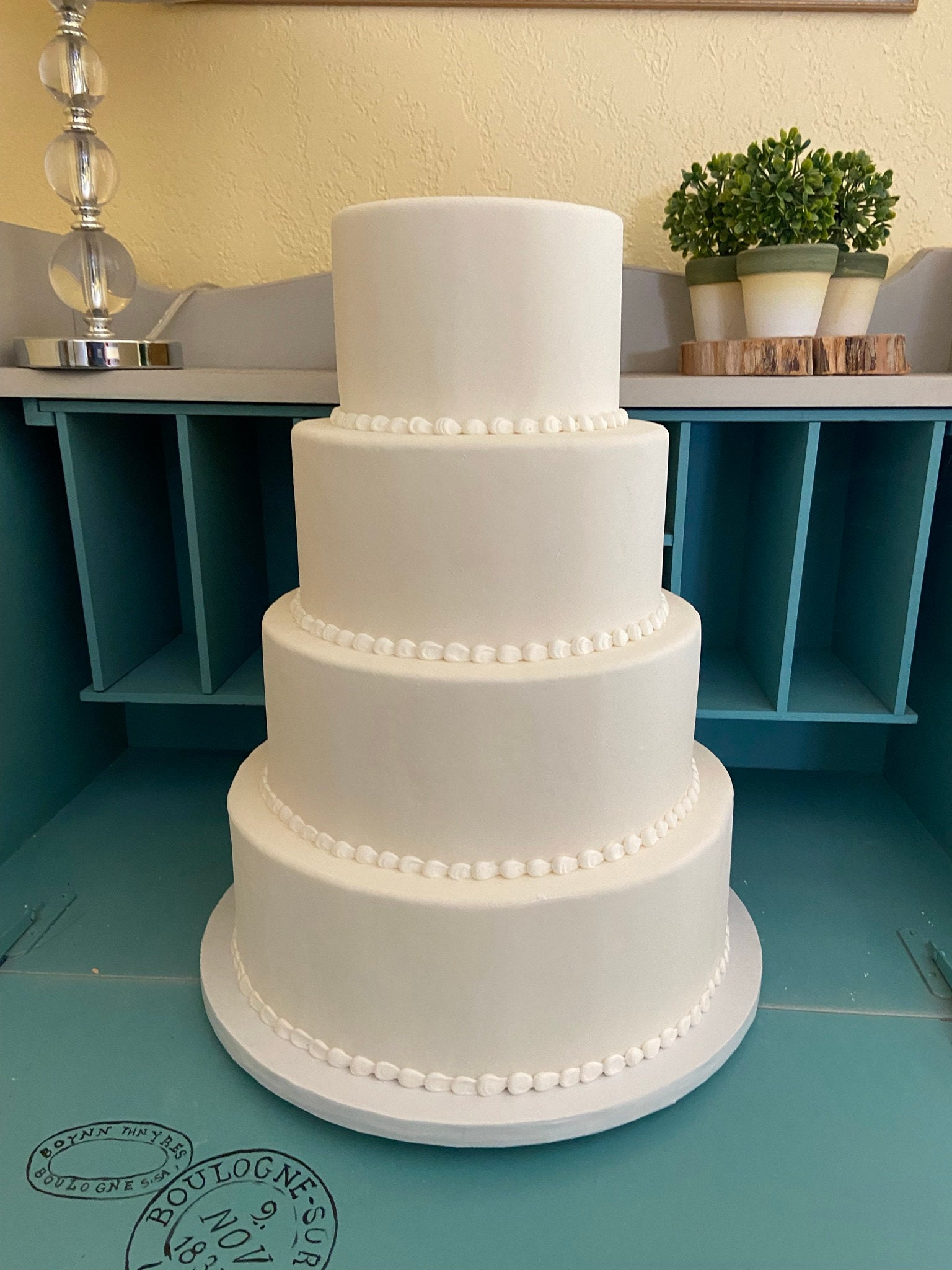 White Wedding Cake With Piping