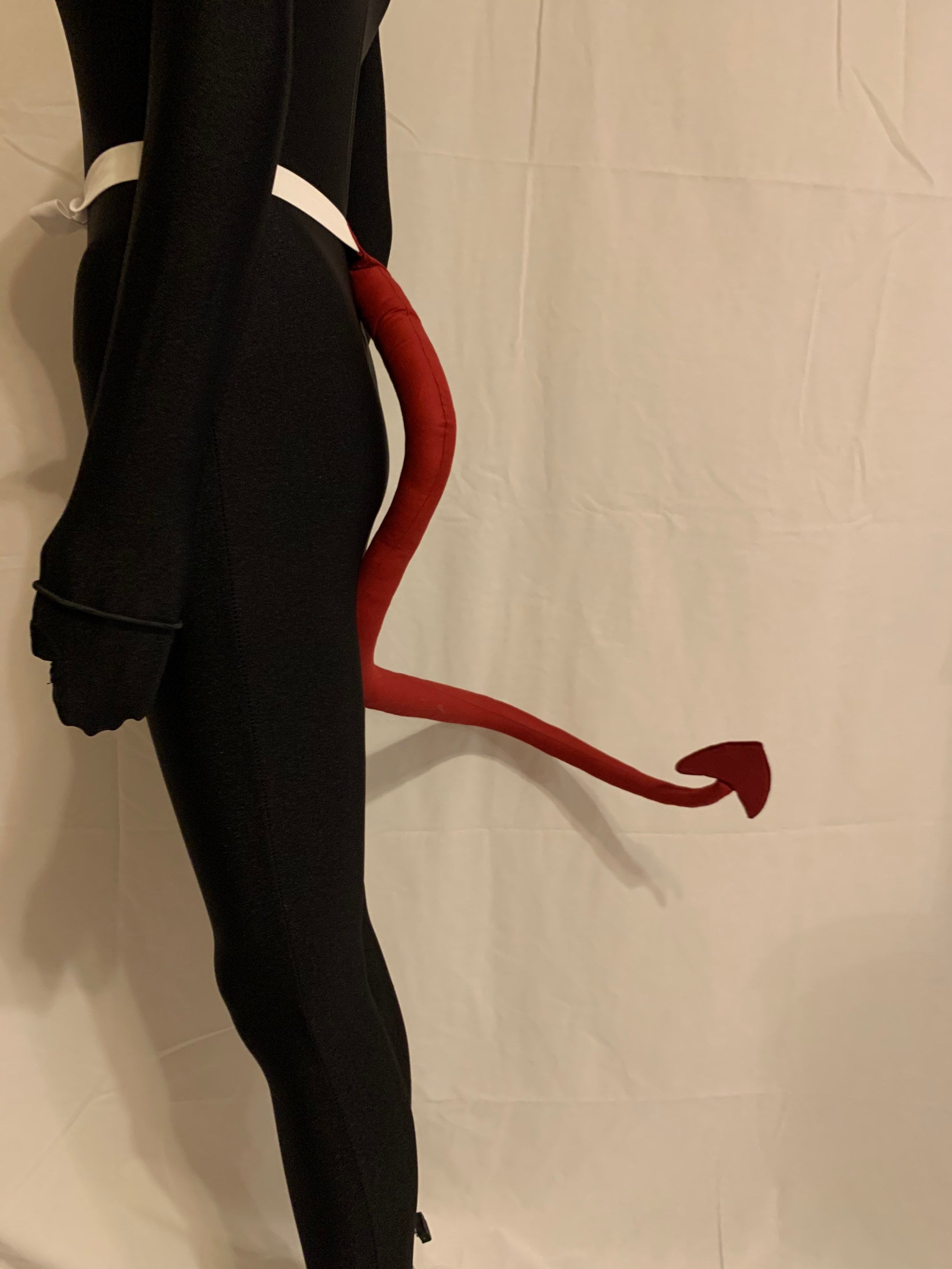 Jester Tail. Curved Curled Spiral Tail With Spade Spear Pointed Tail ...