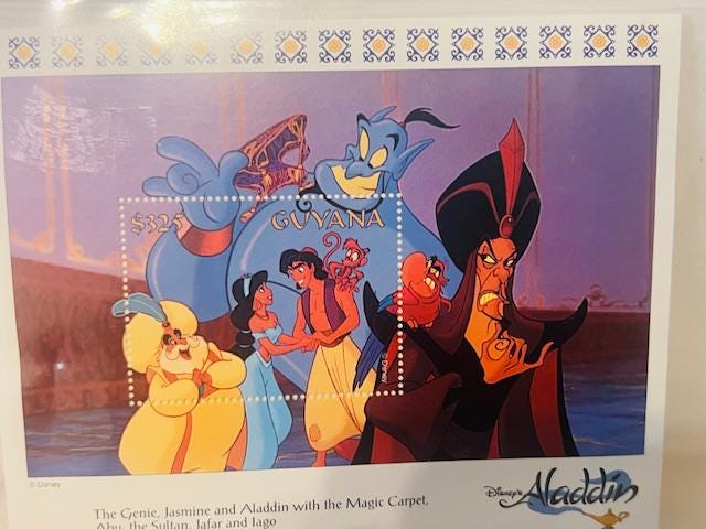 Walt Disney Collectible Postage Stamps Set Animal Stories Aladdin ...