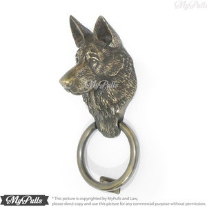 german shepherd ringing bell